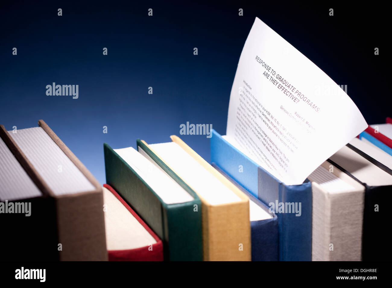 several different color books in a row Stock Photo - Alamy