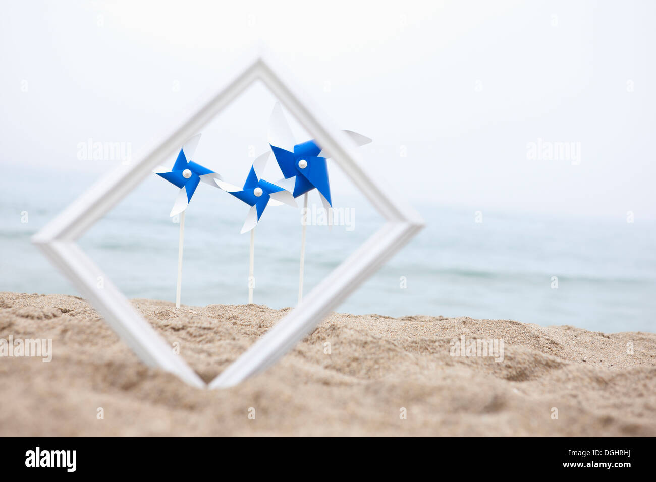 Pinwheel beach toy hi-res stock photography and images - Alamy