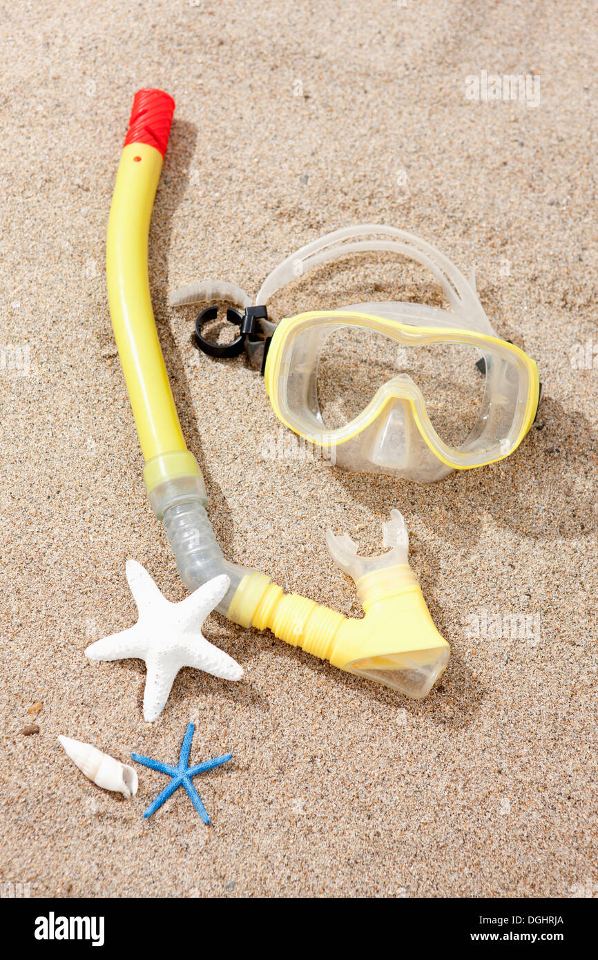 yellow diving gear on a beach Stock Photo - Alamy