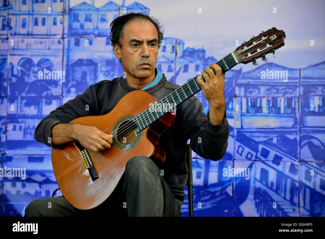 Fado musician performing at a concert in Castelo de Sao Jorge Castle ...