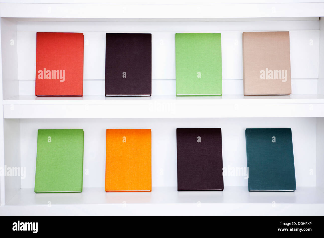 different color books in a row Stock Photo - Alamy