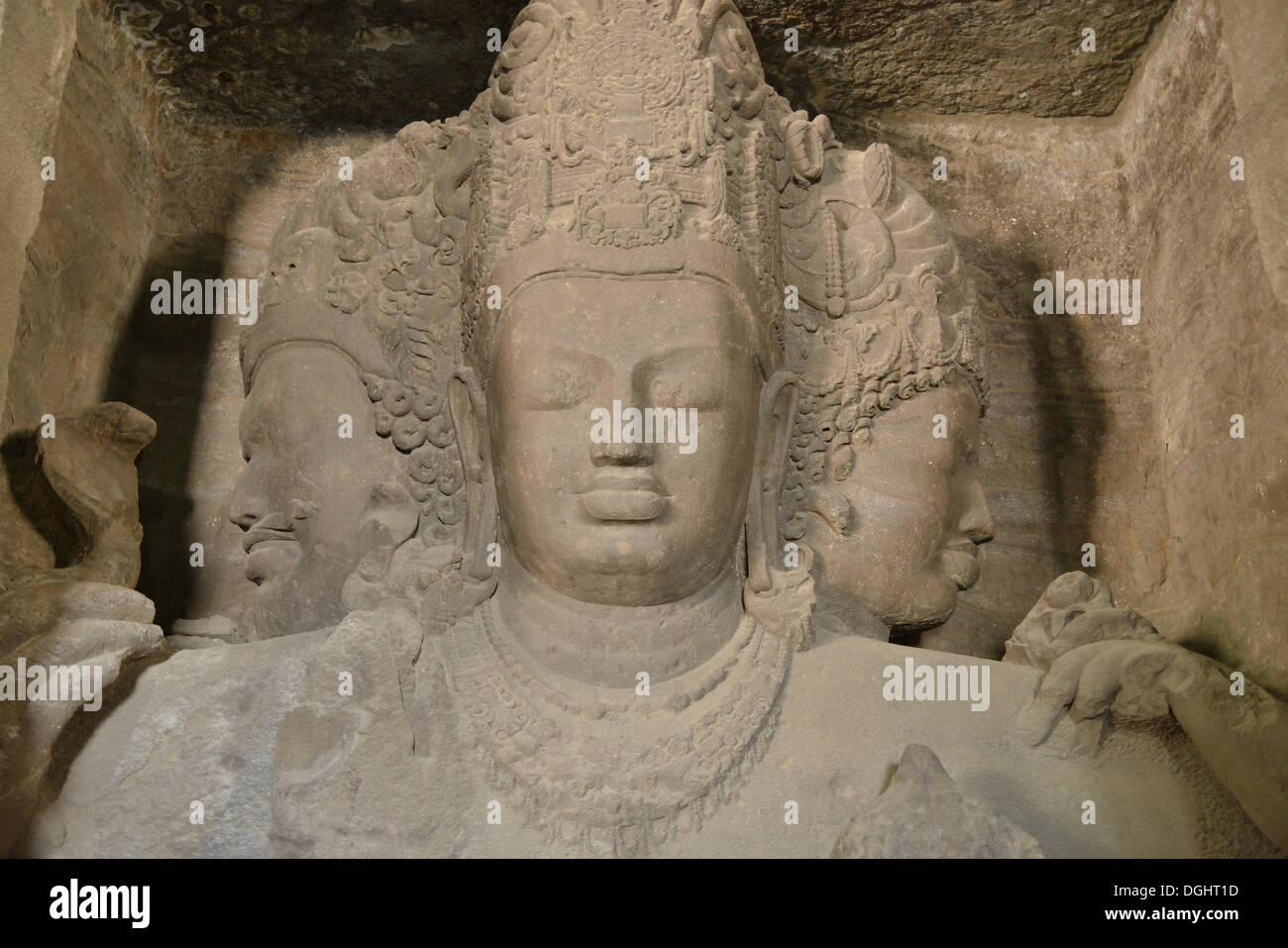Figure of a three-headed Shiva in the main cave of the Shiva temple on ...