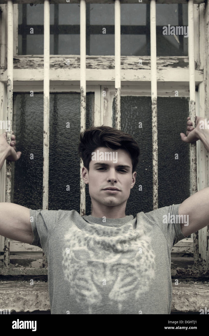 Man behind bars hi-res stock photography and images - Alamy