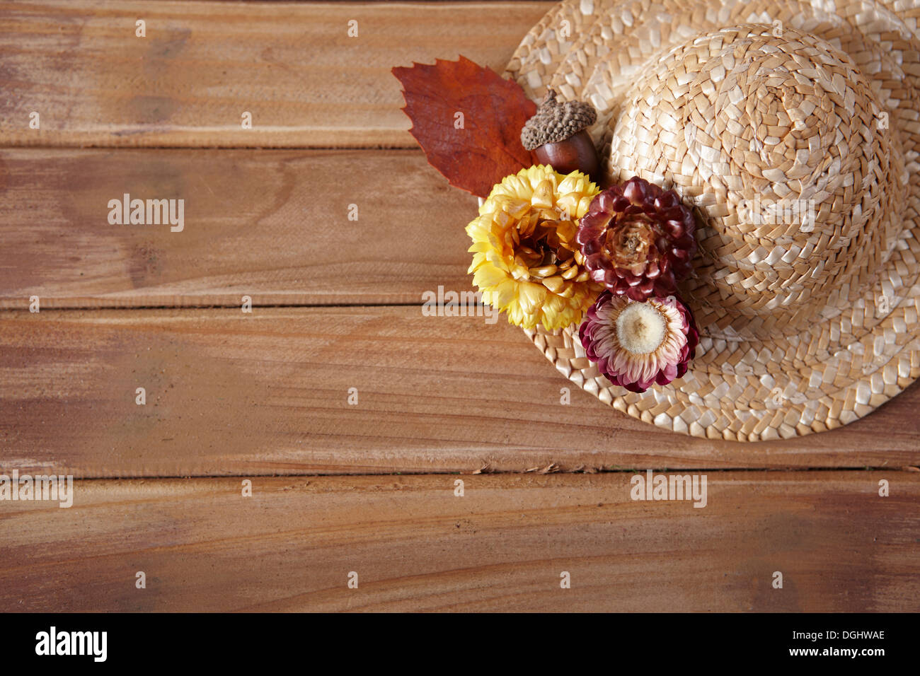 an earthy hay hat on the floor Stock Photo - Alamy