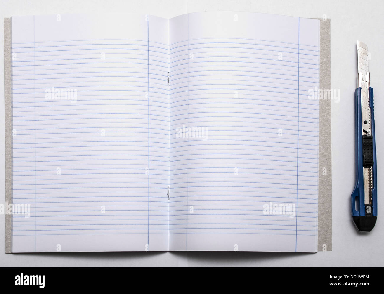 The pen is sharper than the sword. A note with a Utility knife Stock ...