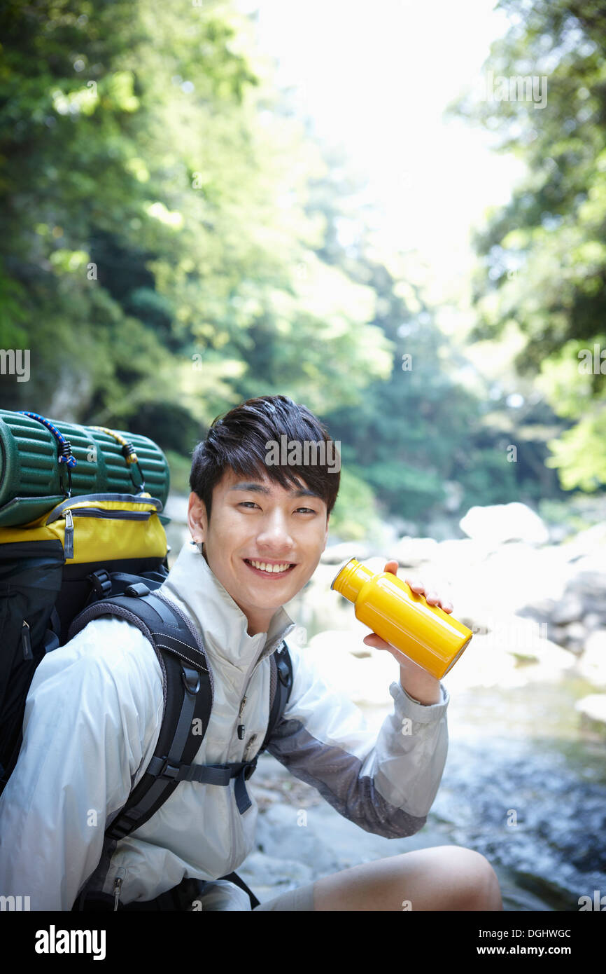 a man taking a rest in the woods Stock Photo - Alamy