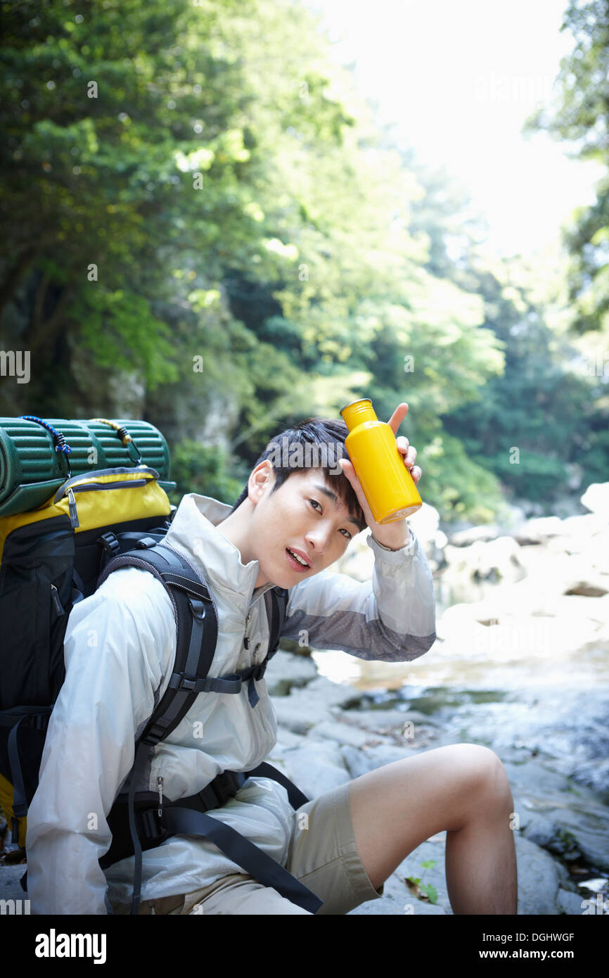 a man taking a rest in the woods Stock Photo - Alamy