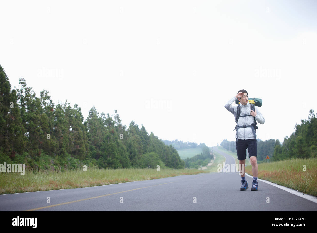 a man hiking on the road Stock Photo - Alamy