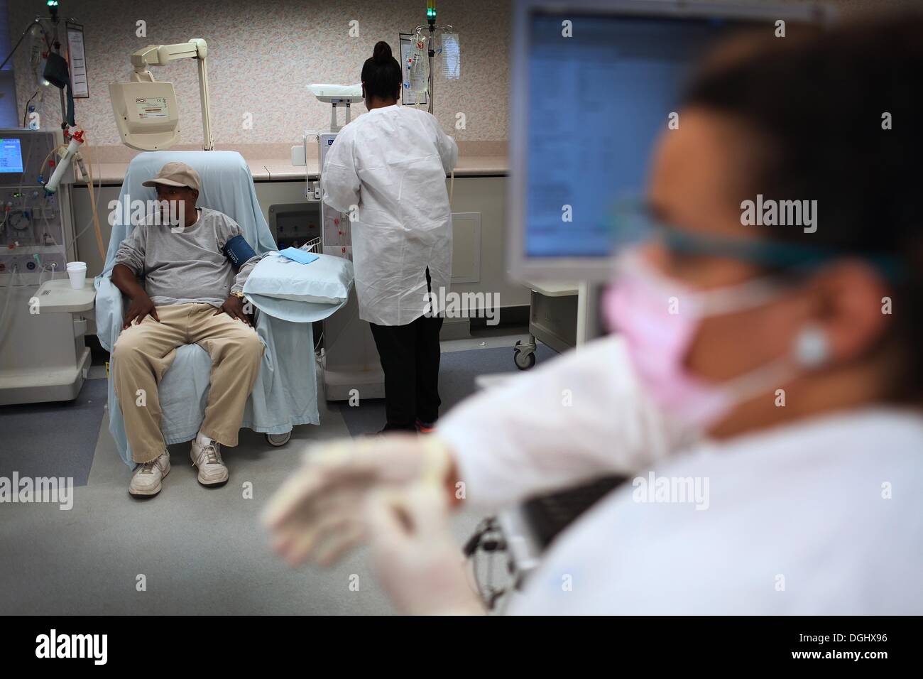 Cleveland, Ohio, USA. 13th Aug, 2013. Byron Spicer gets hooked up to ...