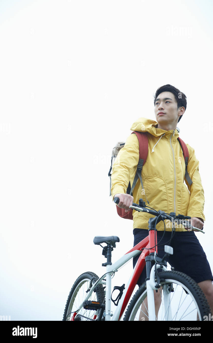 a man riding a bike in the nature Stock Photo - Alamy