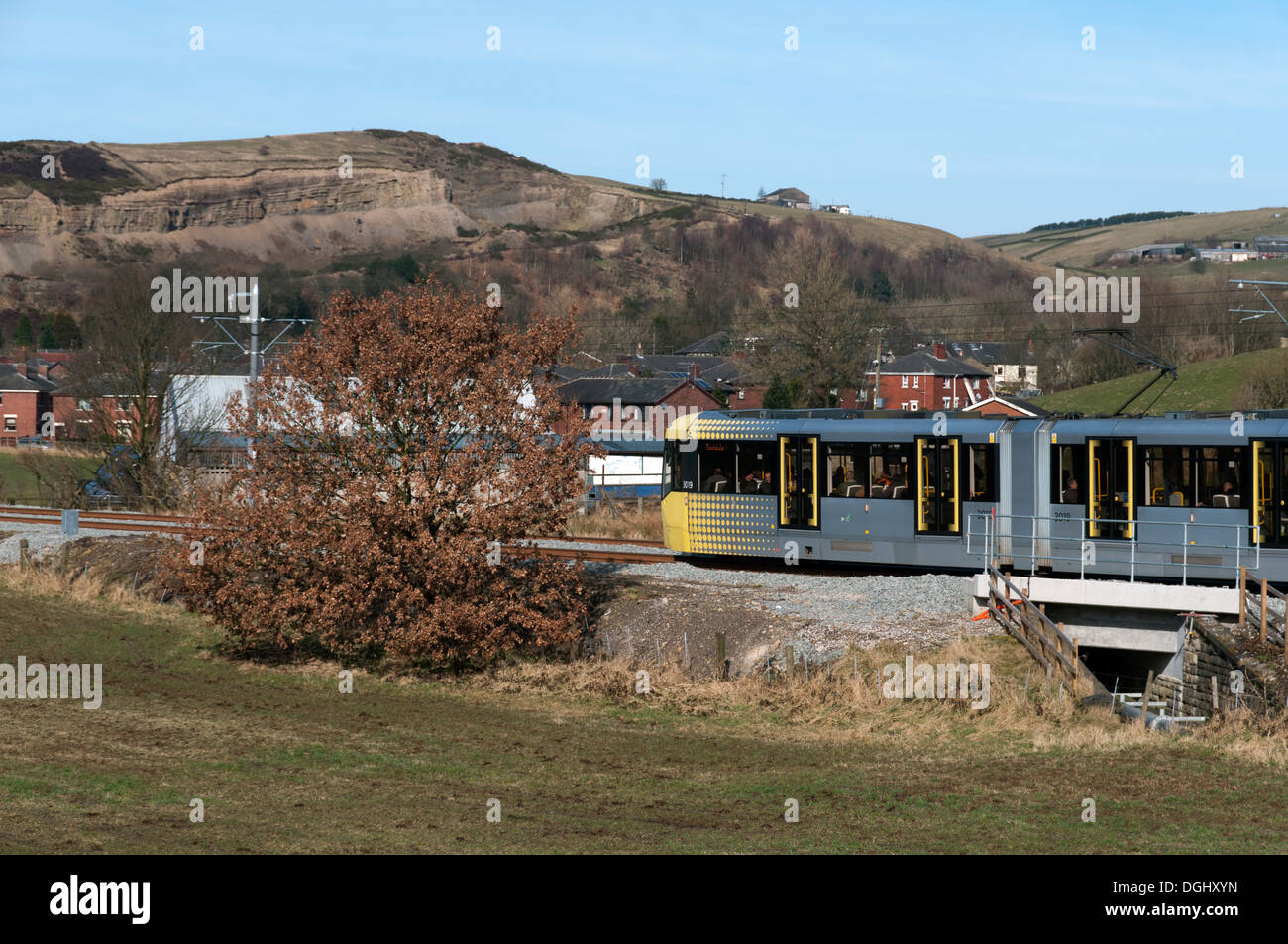 Metrolink tram in the river Beal valley, on the Oldham-Rochdale line ...
