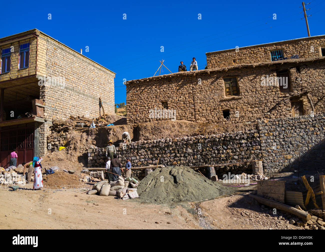 Men Building A House In The Old Kurdish Village Of Palangan, Iran Stock ...