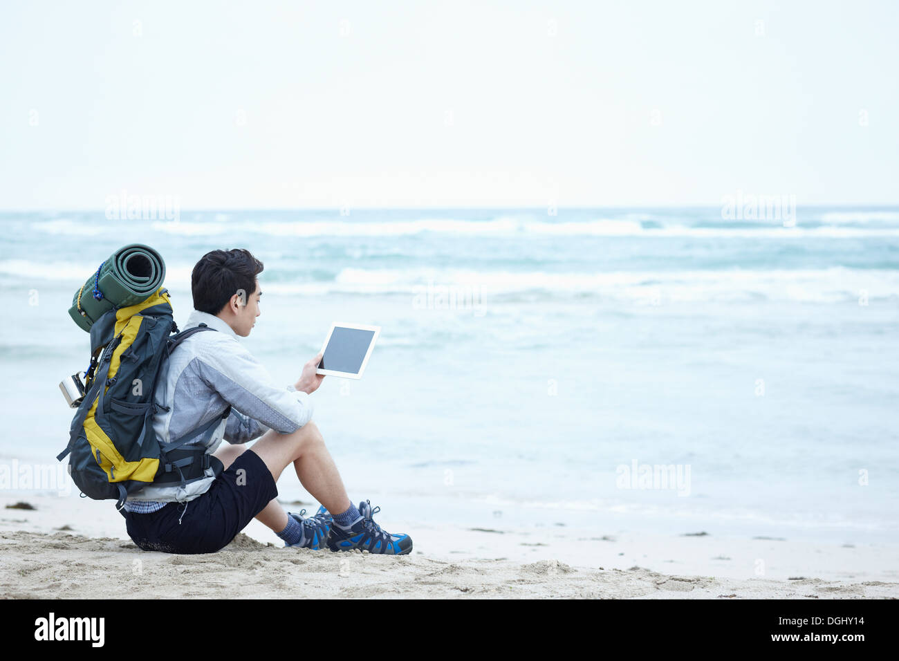 a man having a rest at the beach Stock Photo - Alamy