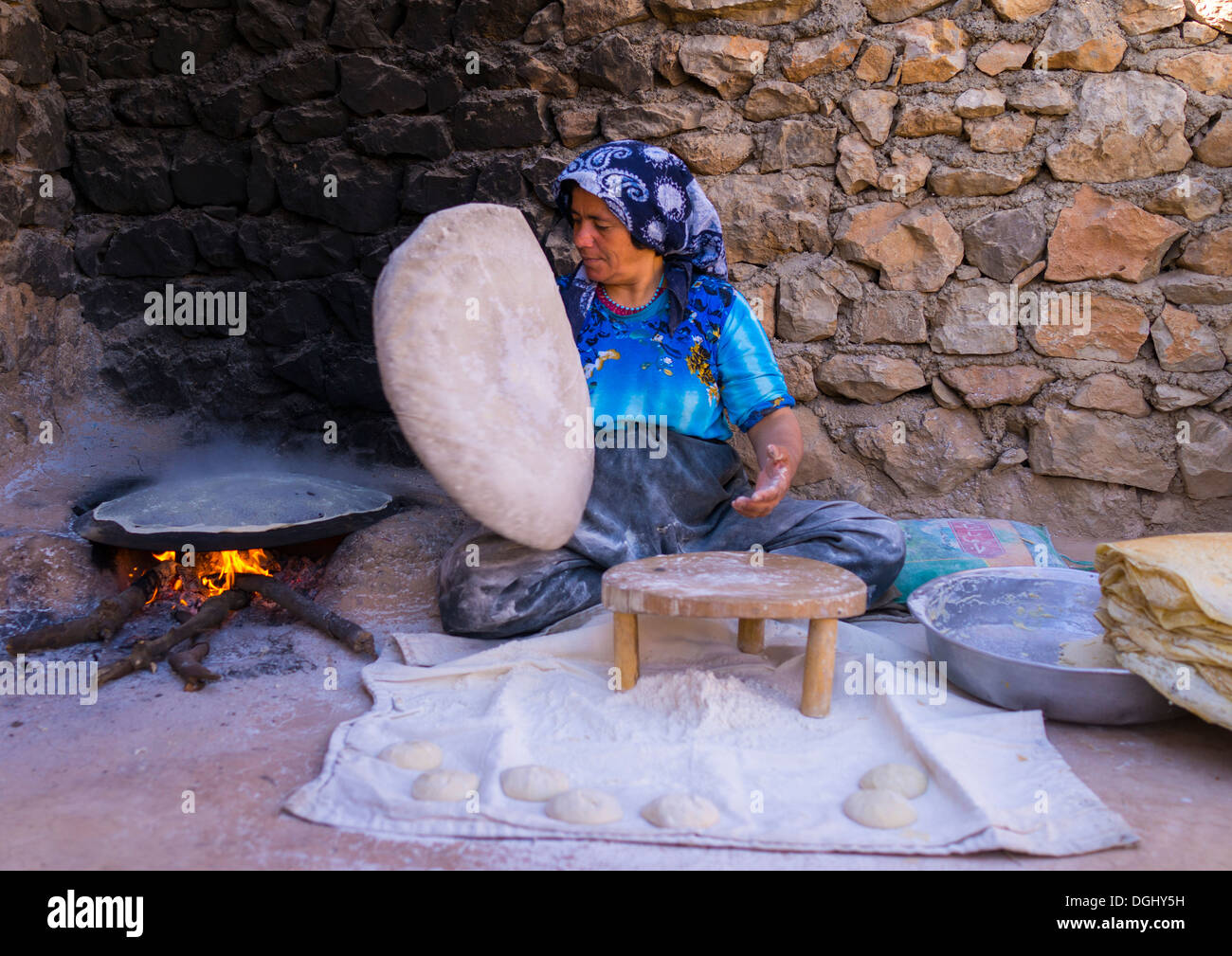 Woman Making Local Bread In The Old Kurdish Village Of Palangan At Dusk ...