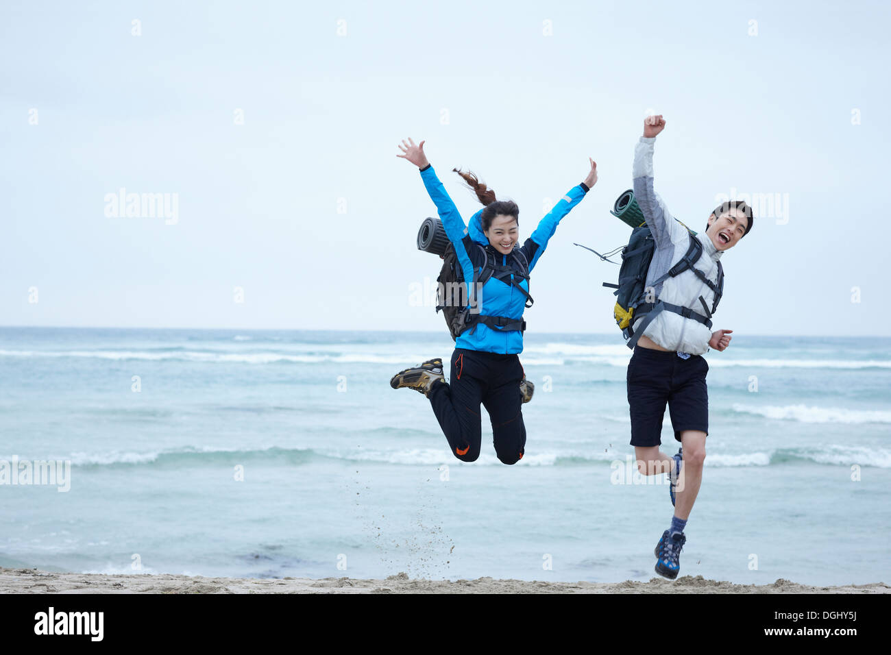 Woman jumping over water hi-res stock photography and images - Alamy