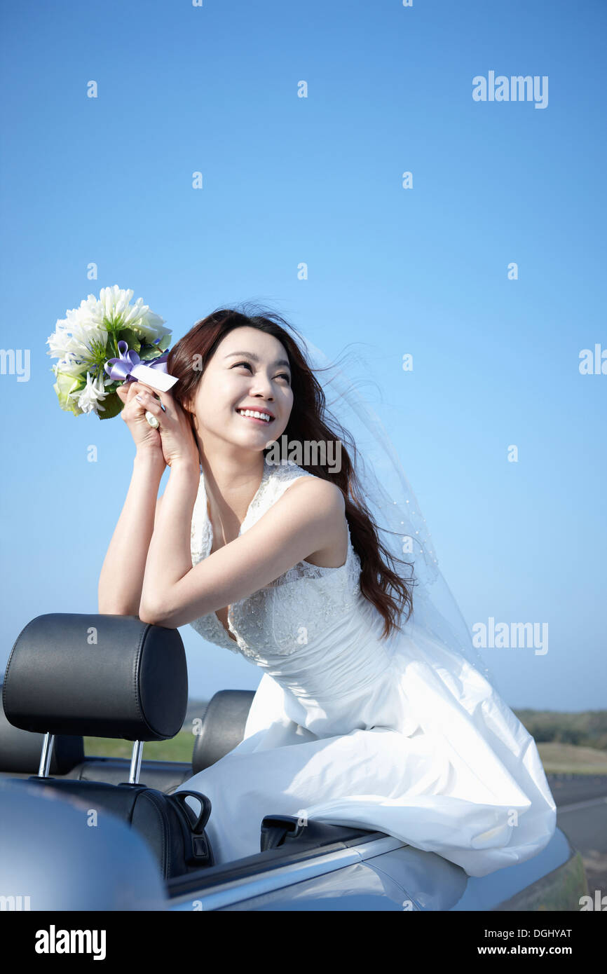 Bride sitting on floor hi-res stock photography and images - Alamy