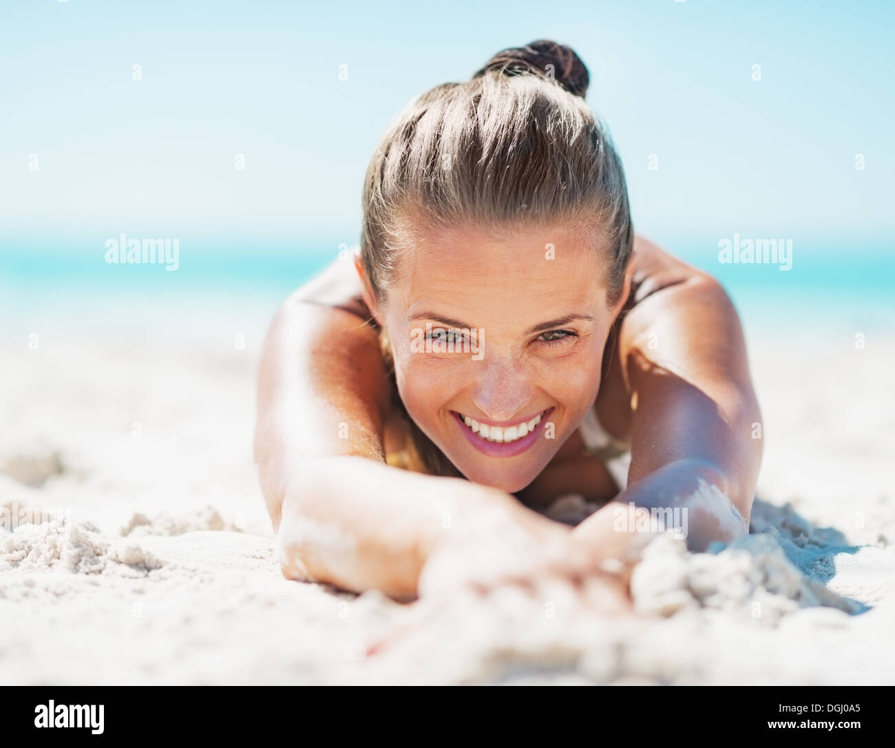 Laying on sandy beach hi-res stock photography and images - Alamy