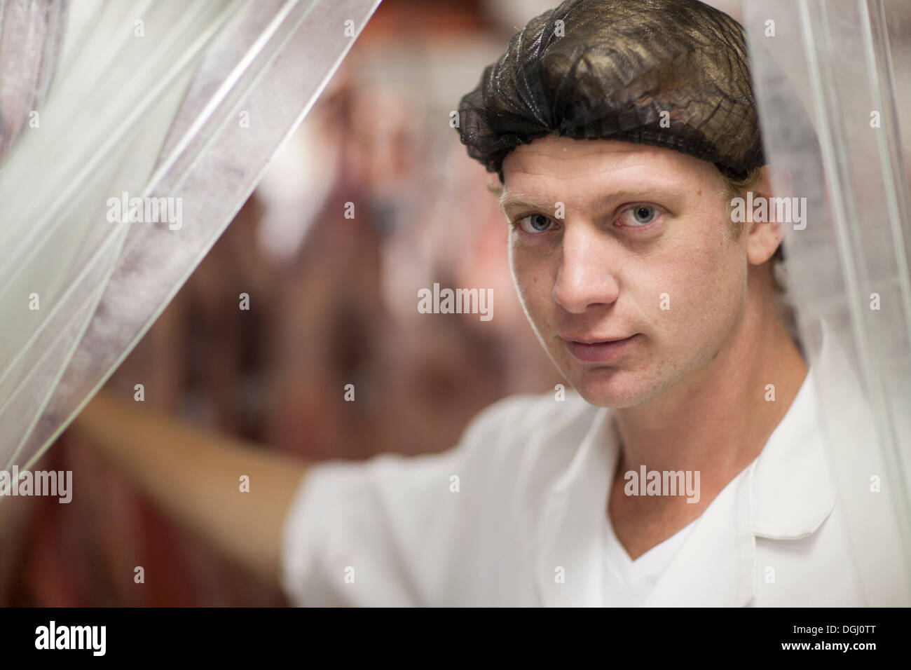 Portrait of butcher wearing hairnet, close up Stock Photo - Alamy