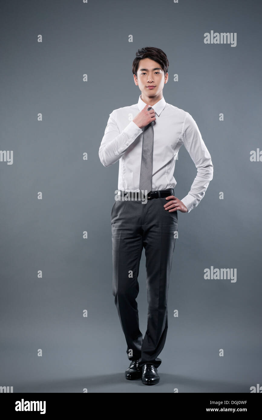a business man standing Stock Photo - Alamy
