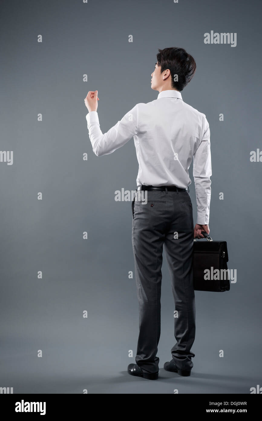 a business man standing Stock Photo - Alamy