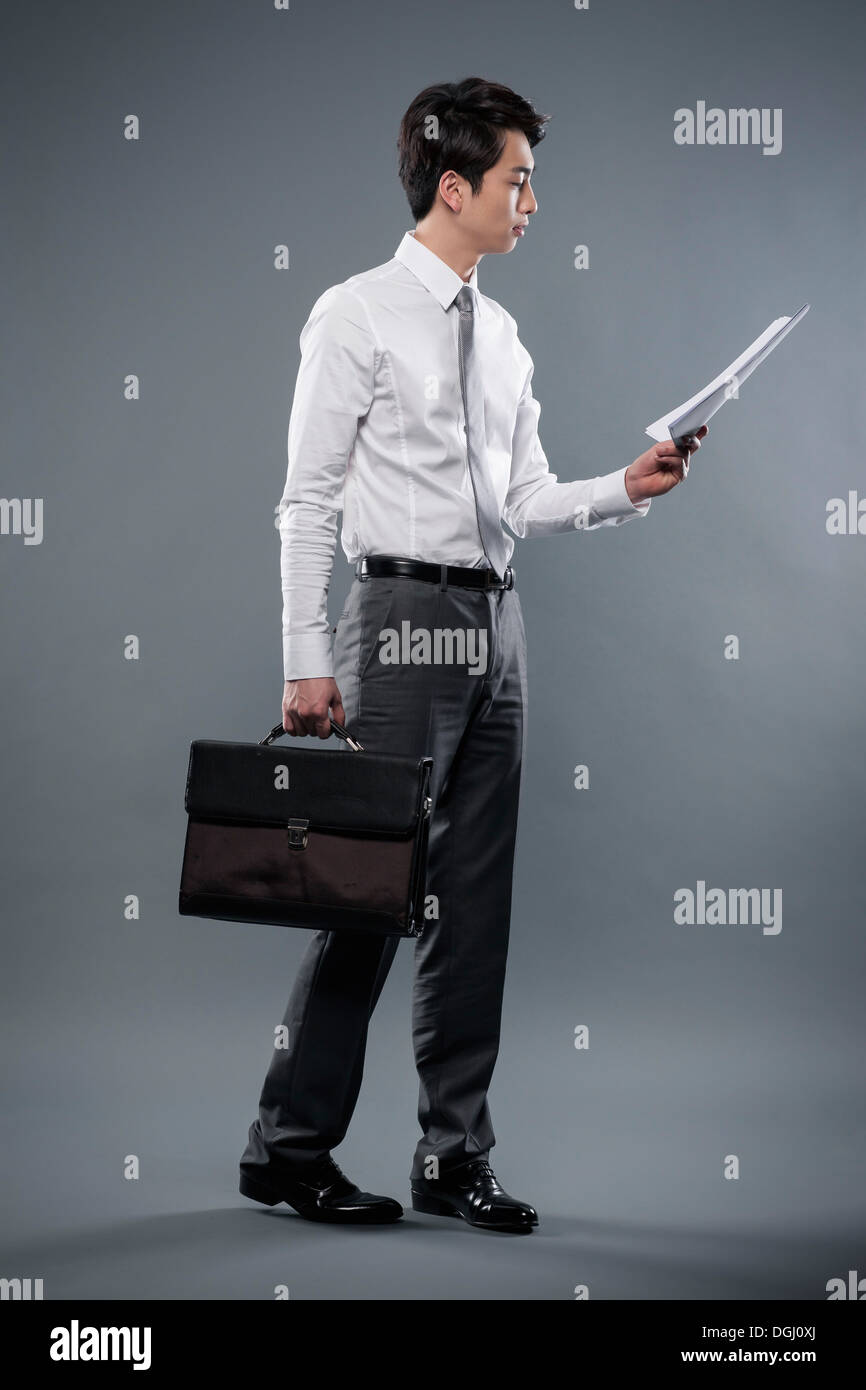 a business man standing Stock Photo - Alamy