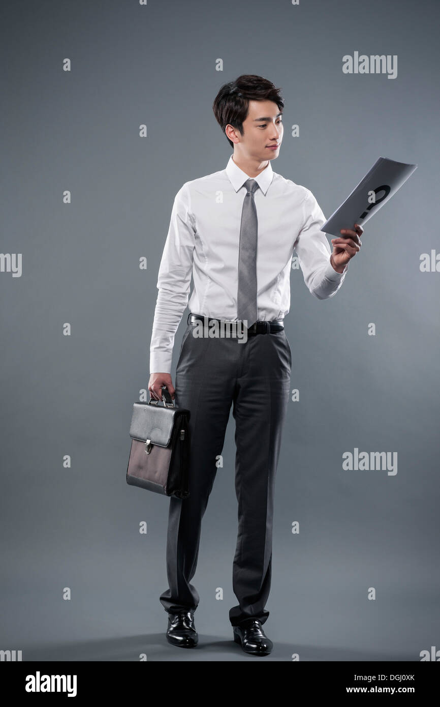 a business man standing Stock Photo - Alamy