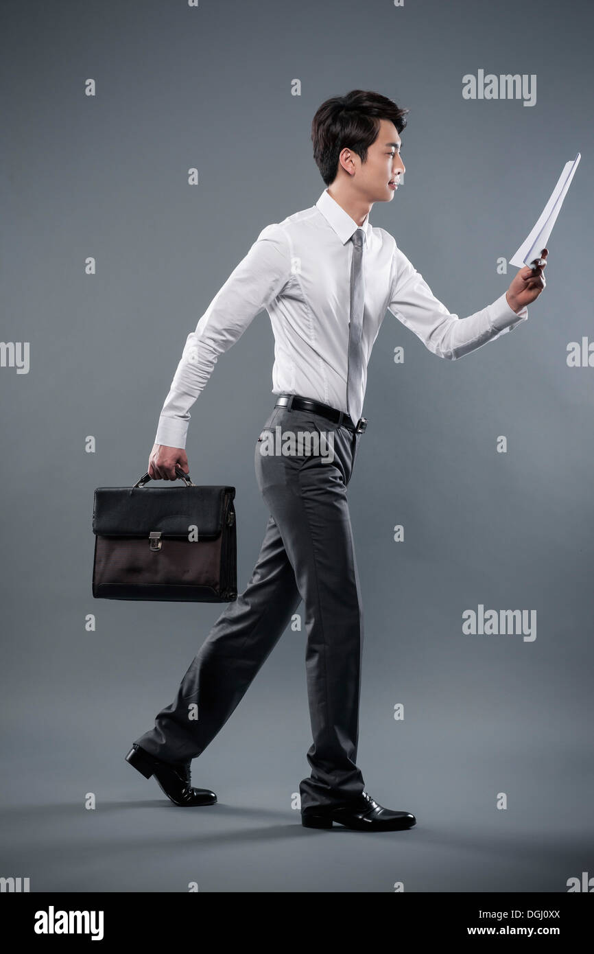 a business man standing Stock Photo - Alamy