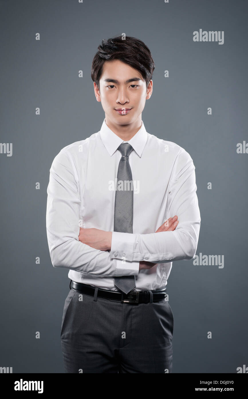 a business man standing Stock Photo - Alamy