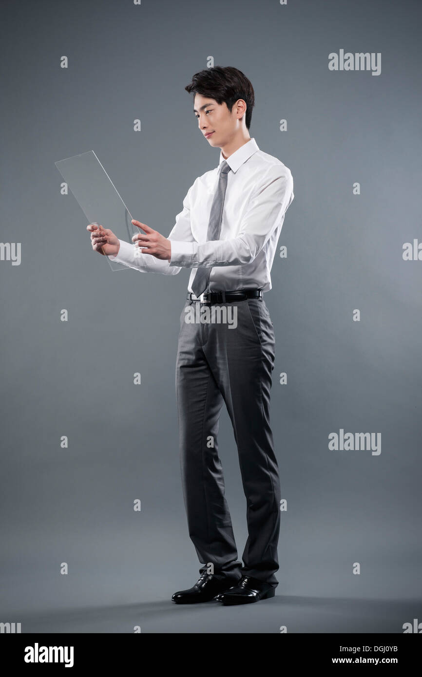 a business man standing Stock Photo - Alamy