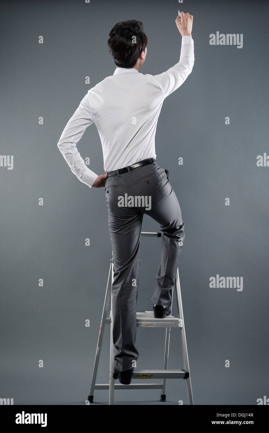 Holding step ladder hi-res stock photography and images - Alamy