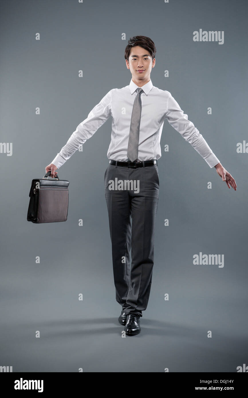 a business man walking Stock Photo - Alamy