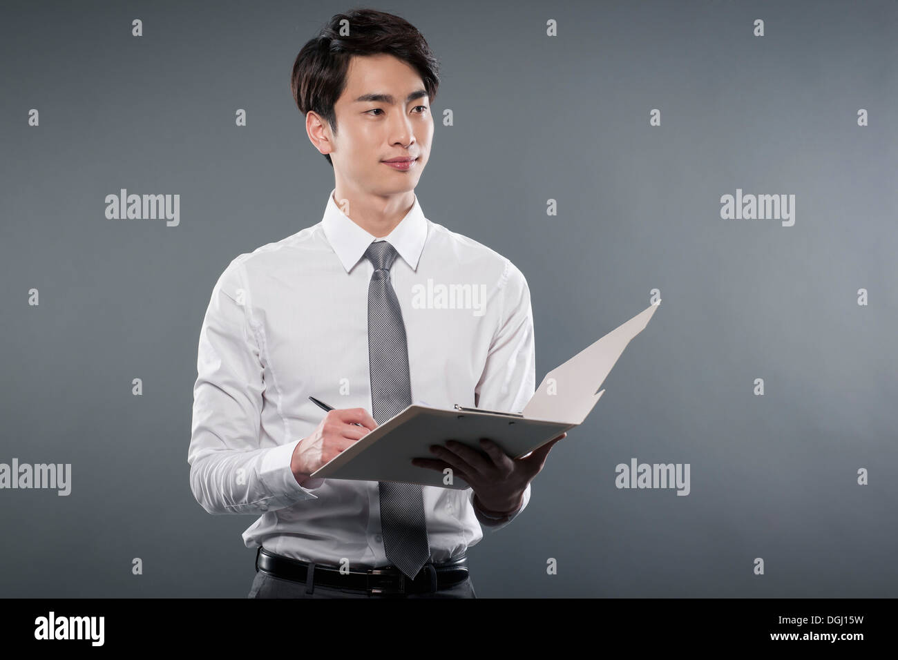 Holding pen and file hi-res stock photography and images - Alamy