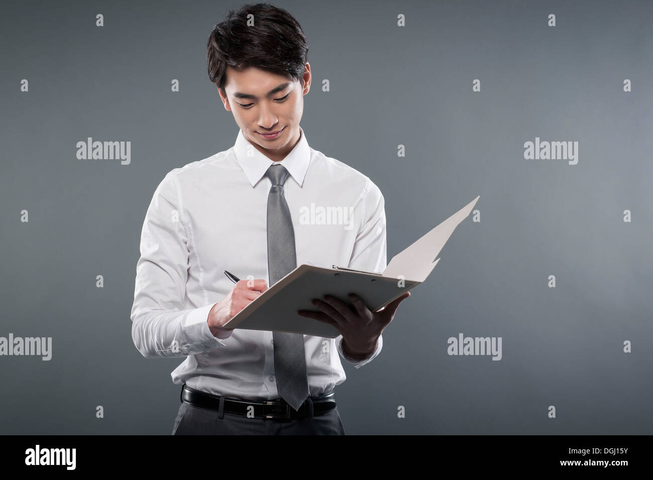 Holding pen and file hi-res stock photography and images - Alamy