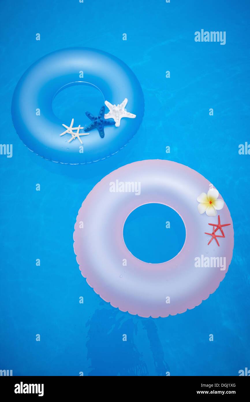 two swimming tubes in the water Stock Photo - Alamy