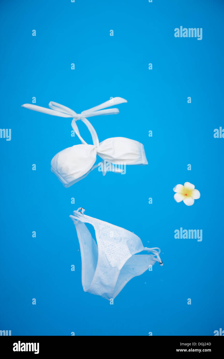 bikinis floating in the water Stock Photo - Alamy