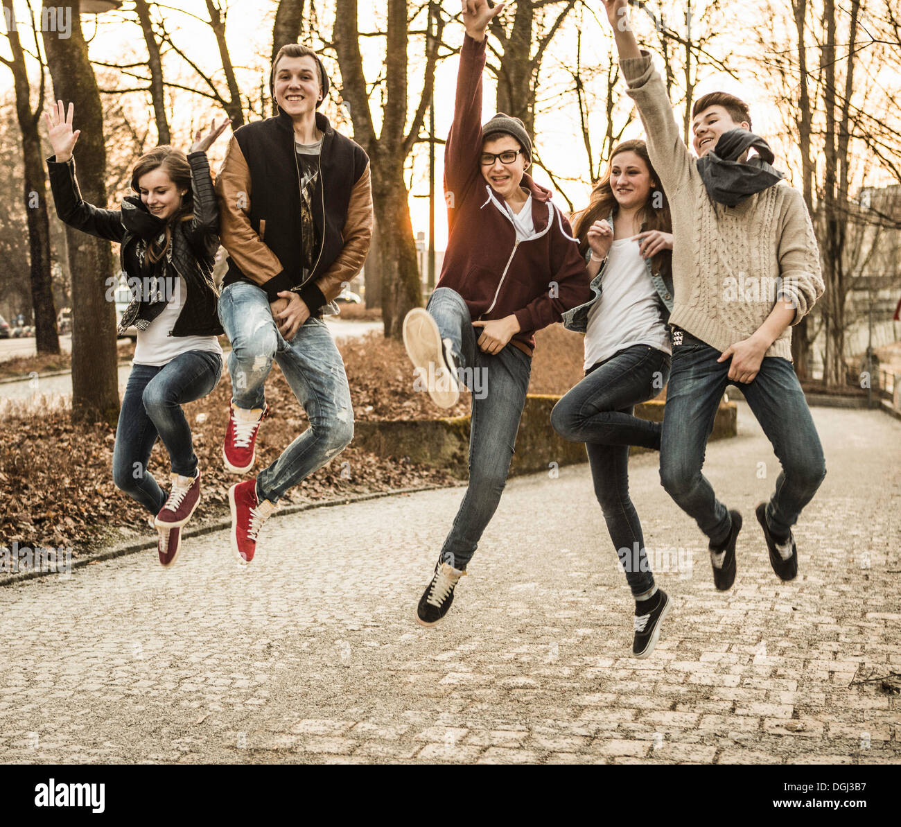Jumping teenagers hi-res stock photography and images - Alamy