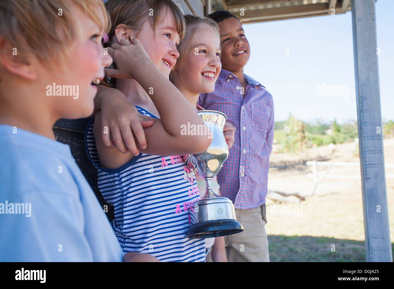 Girl winning trophy hi-res stock photography and images - Alamy