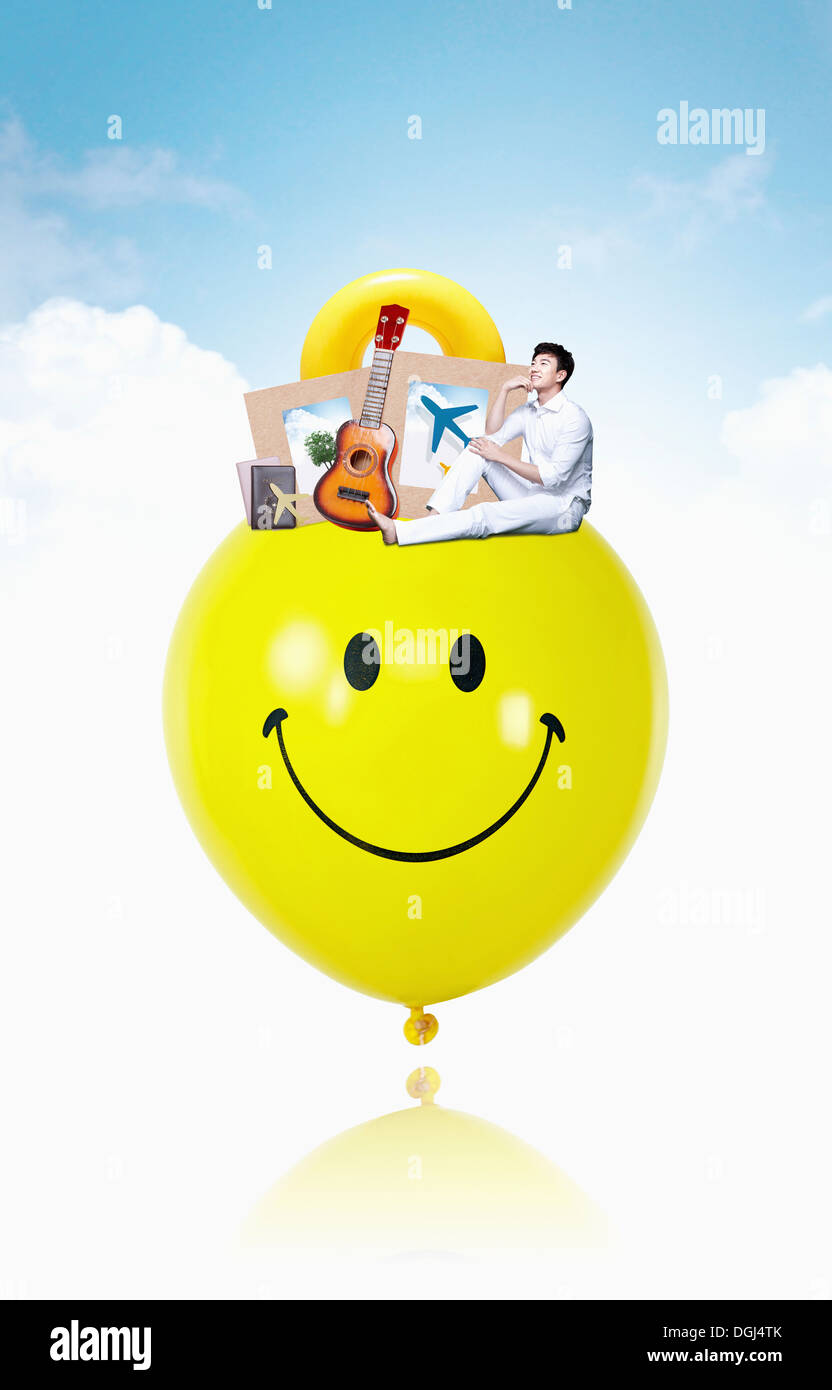 Smile face on the yellow balloon hi-res stock photography and images ...