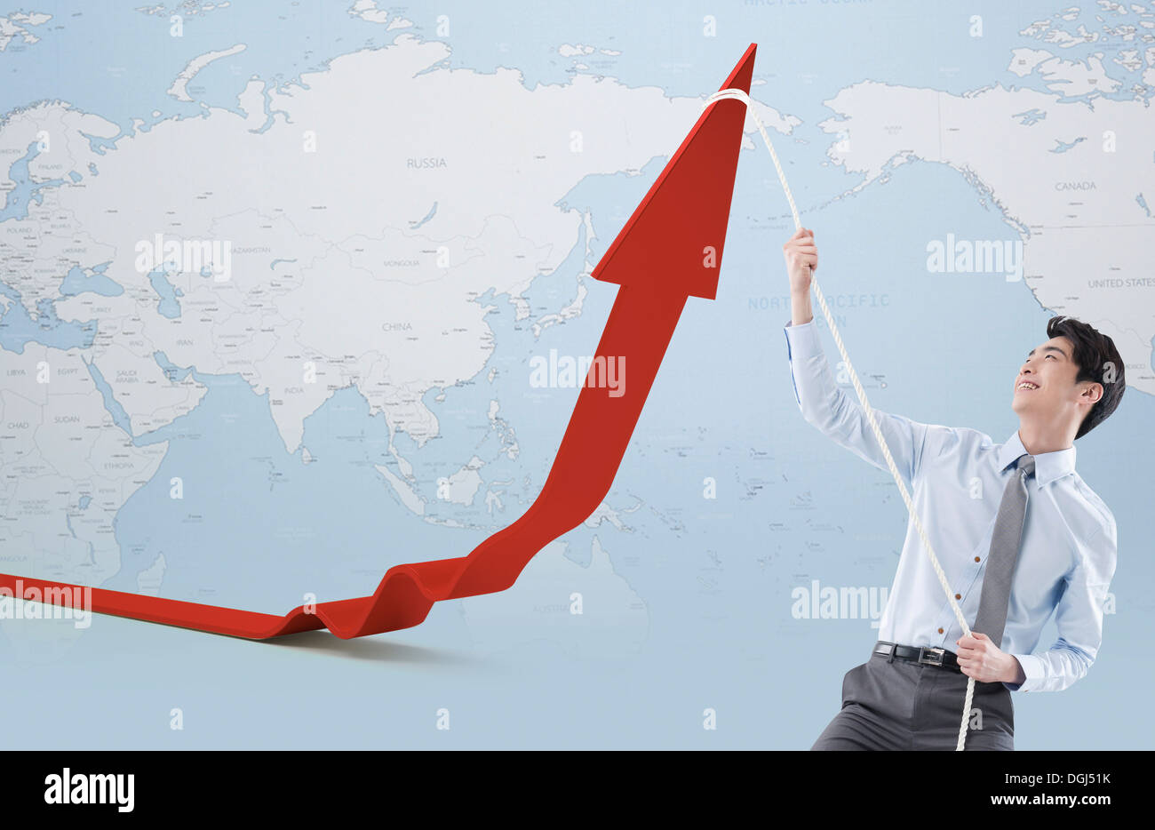 a business man pulling down an arrow with a cord Stock Photo - Alamy