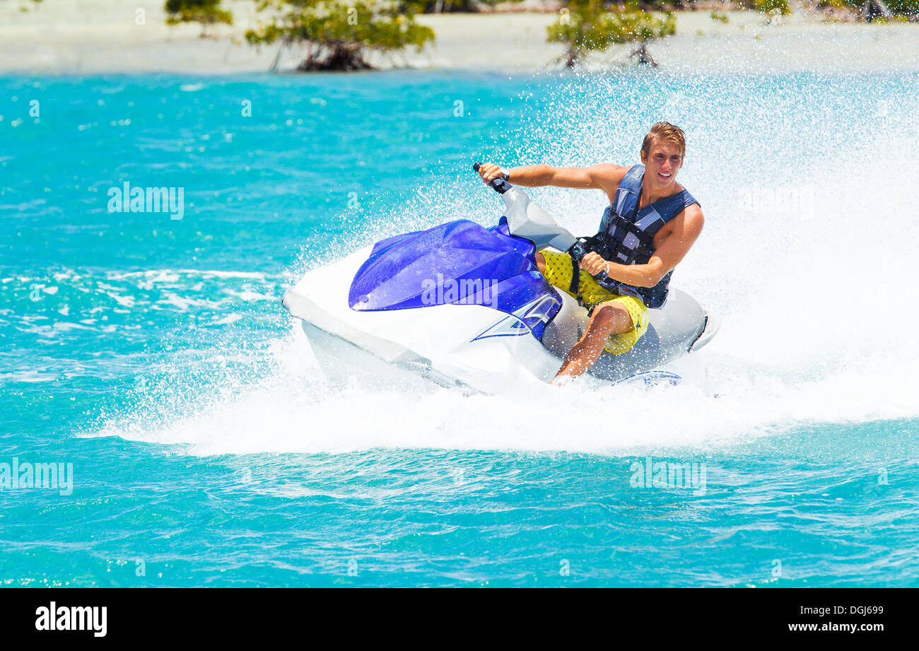 Sitting on jet ski hi-res stock photography and images - Alamy