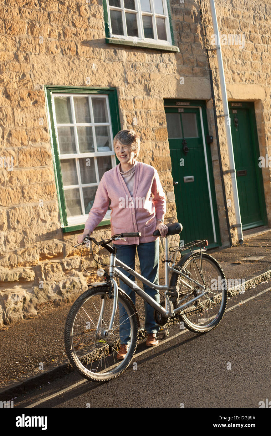 Man pushing his bicycle hi-res stock photography and images - Alamy