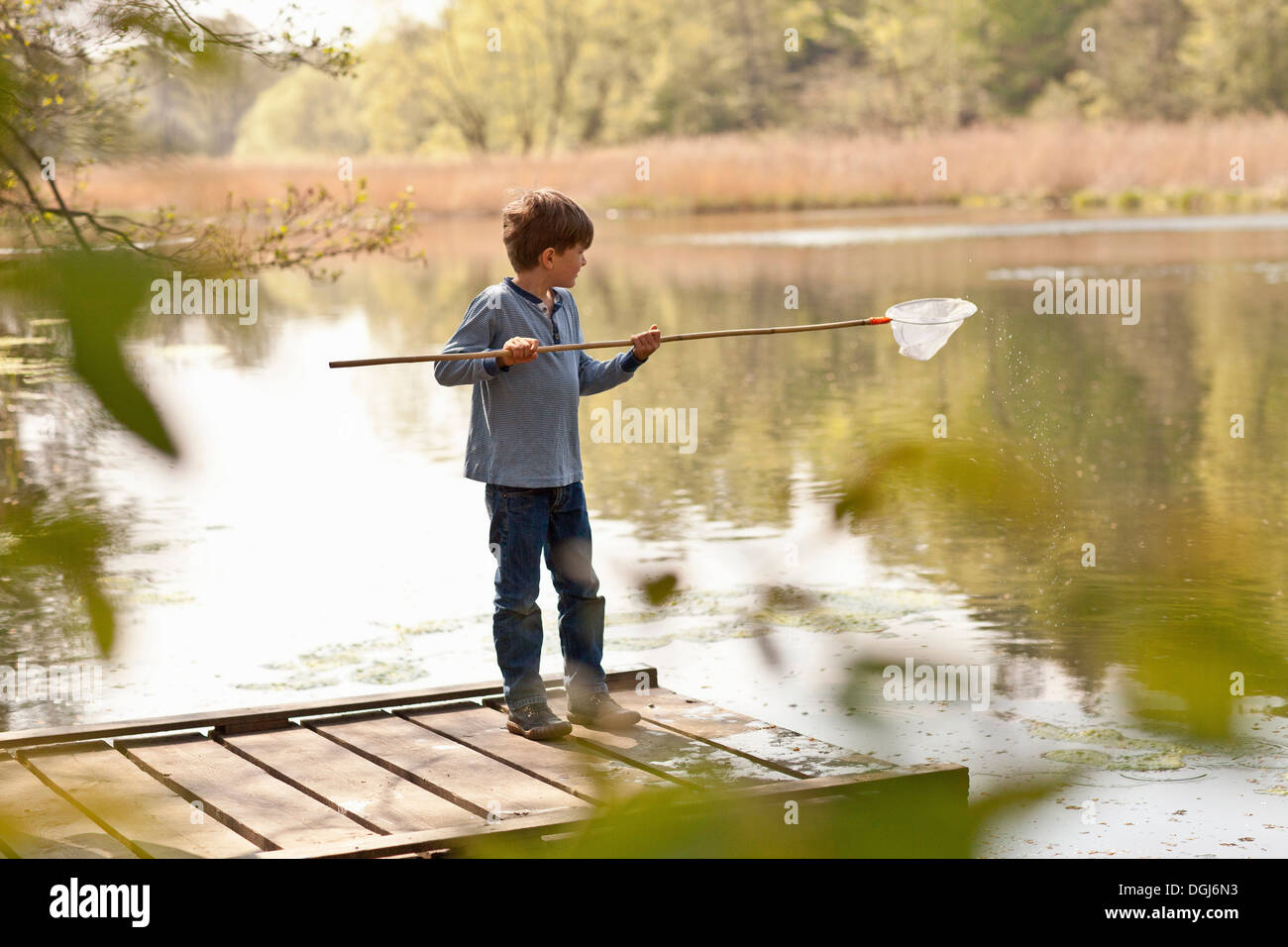 Boy Fishing On Pier High Resolution Stock Photography and Images - Alamy