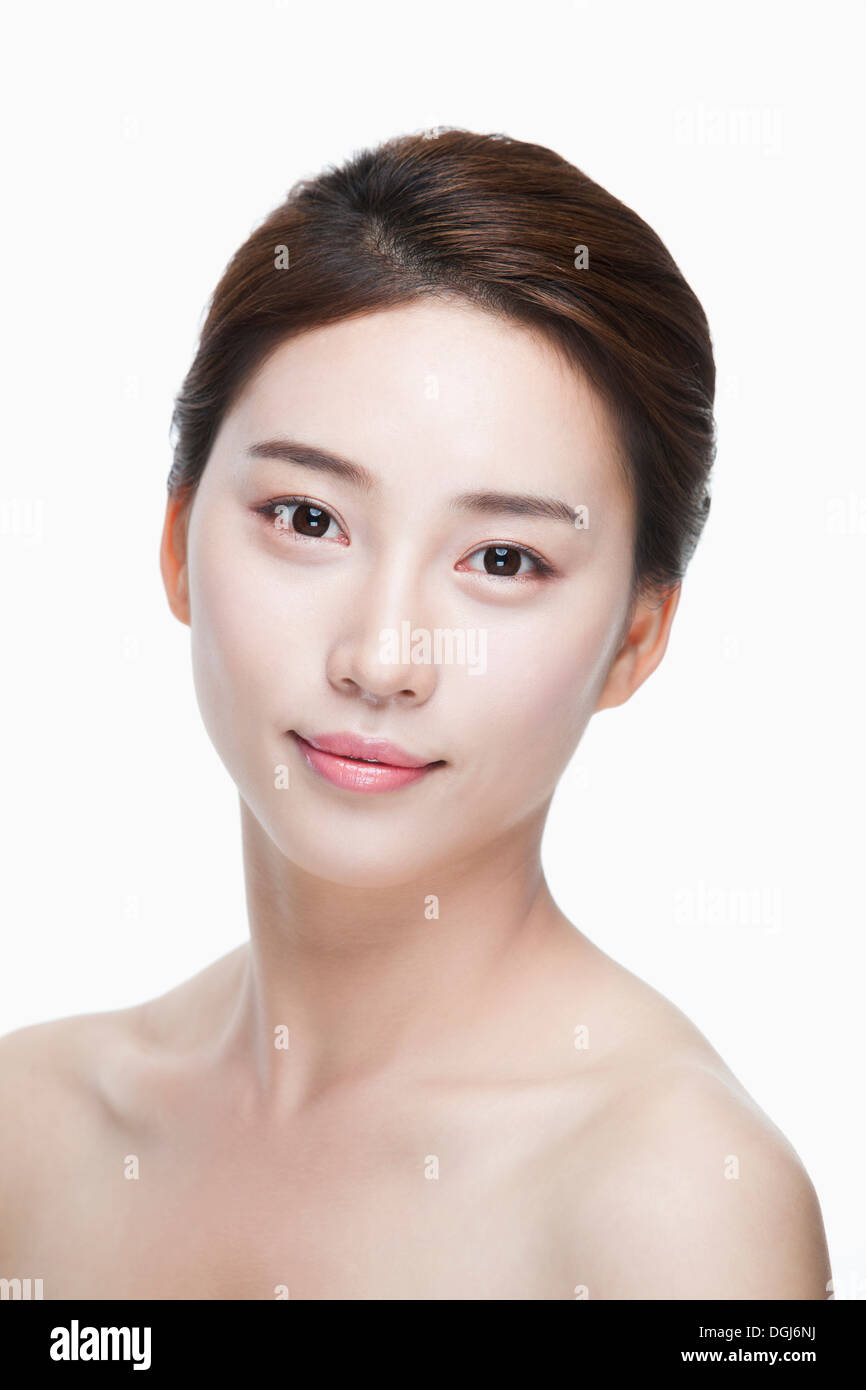 a woman posing with a white background Stock Photo - Alamy