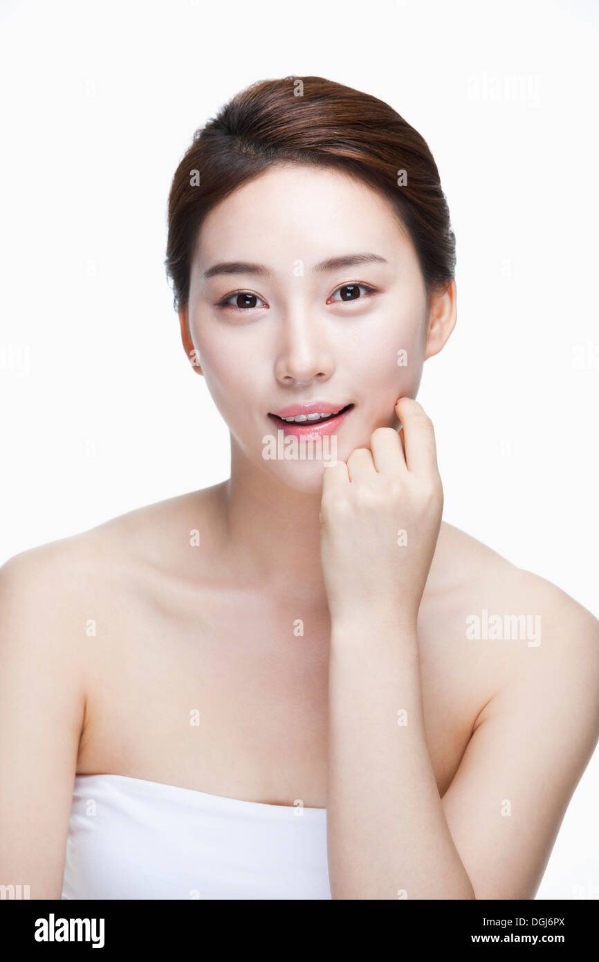 a woman posing with a white background Stock Photo - Alamy