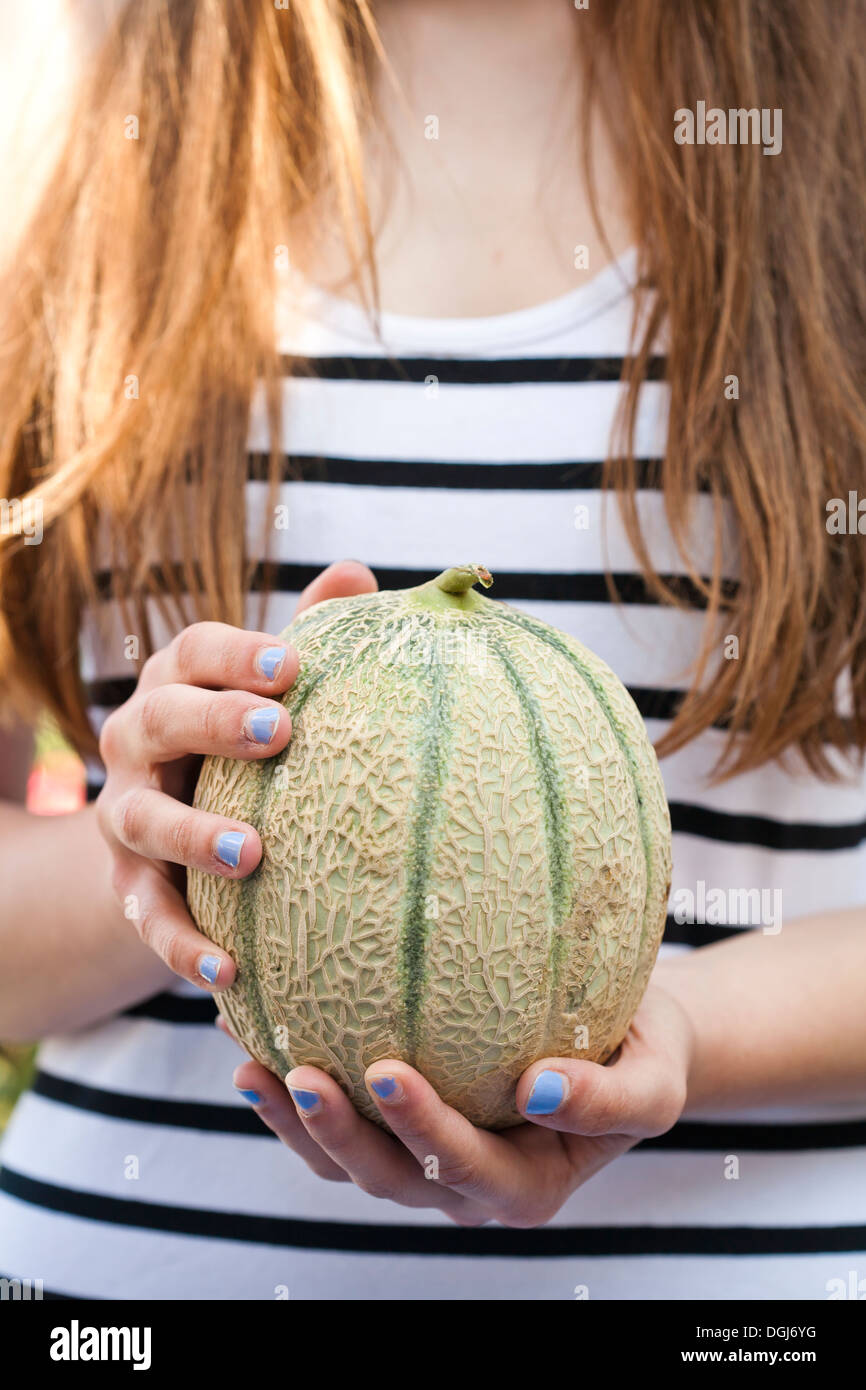 Female eating melon hi-res stock photography and images - Alamy
