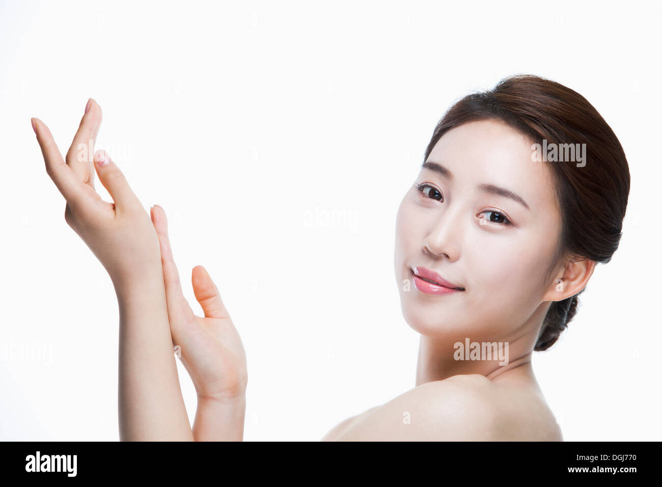 Woman ponytail looking up hi-res stock photography and images - Alamy