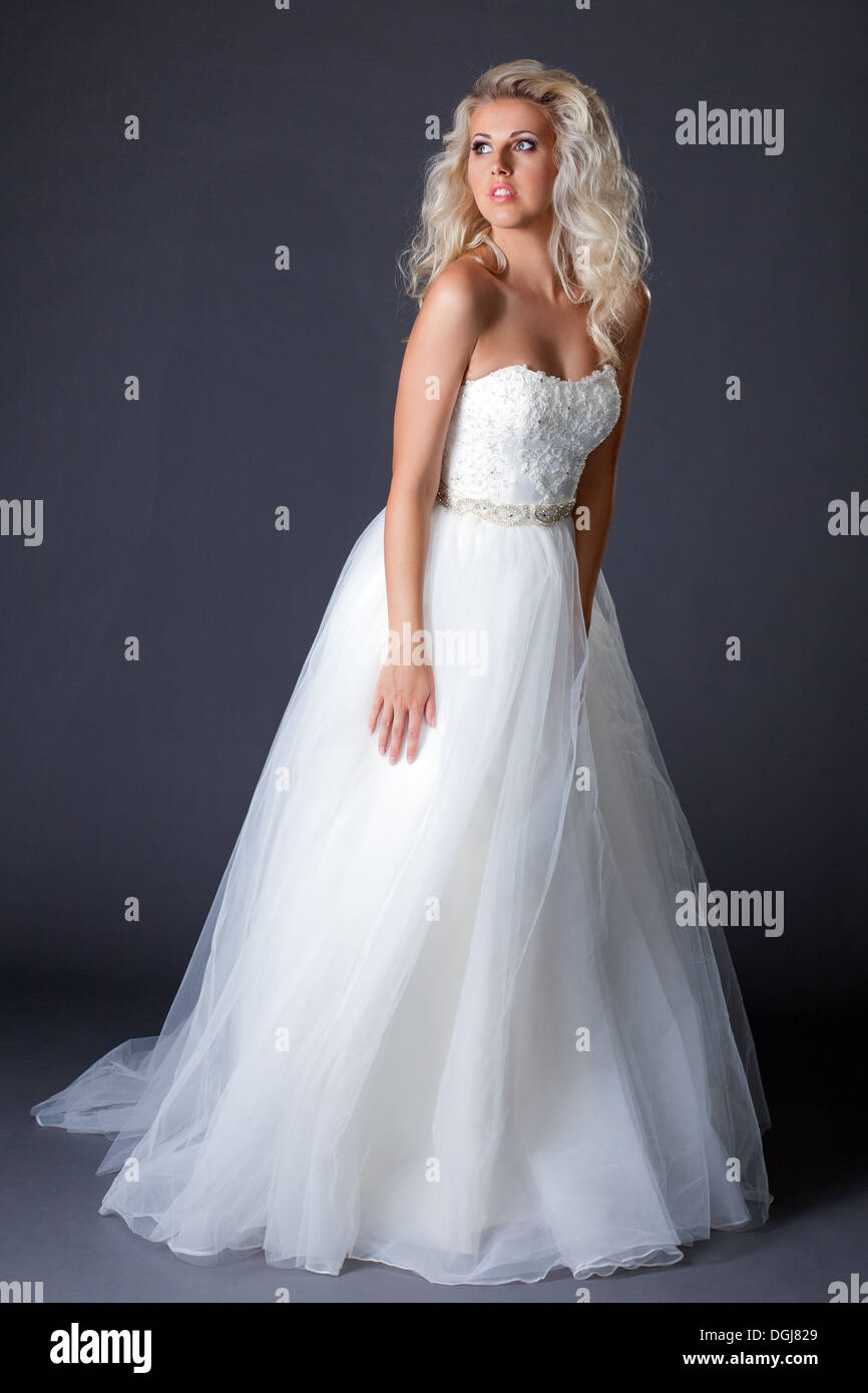 Romantic model posing in fashionable wedding dress Stock Photo - Alamy
