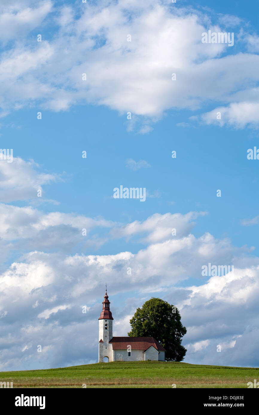 Scenery with clouds and church Stock Photo - Alamy