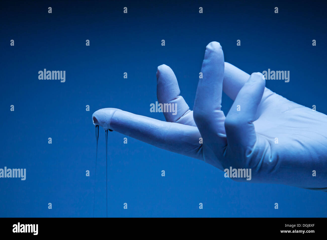 Latex gloved hand Stock Photo - Alamy