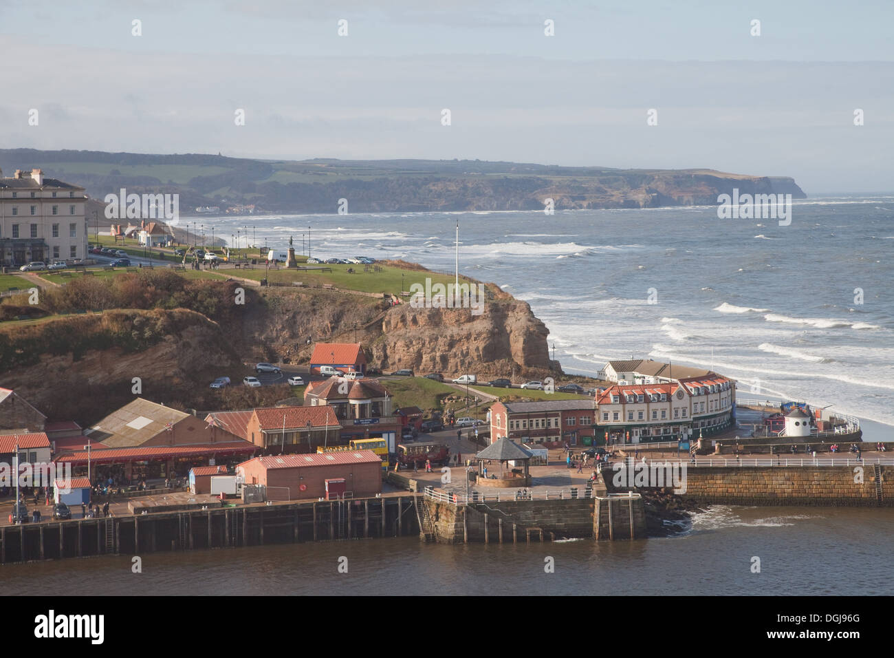 Whitby Harbour /sea front sea wall north sea and waves whipped up by ...